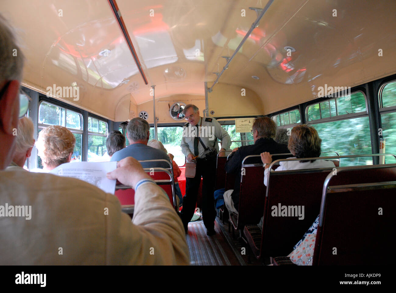 Passengers and conductor on a restored 1959 Leyland Tiger Cub King ...