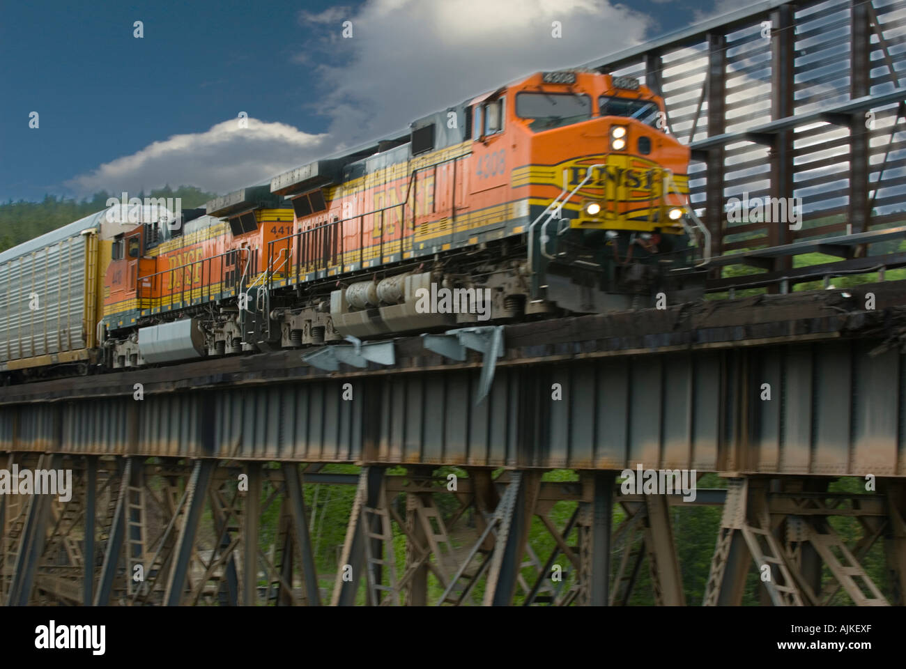 train crossing wooden bridge Stock Photo - Alamy