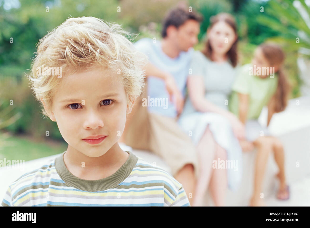 Boy and his family Stock Photo - Alamy