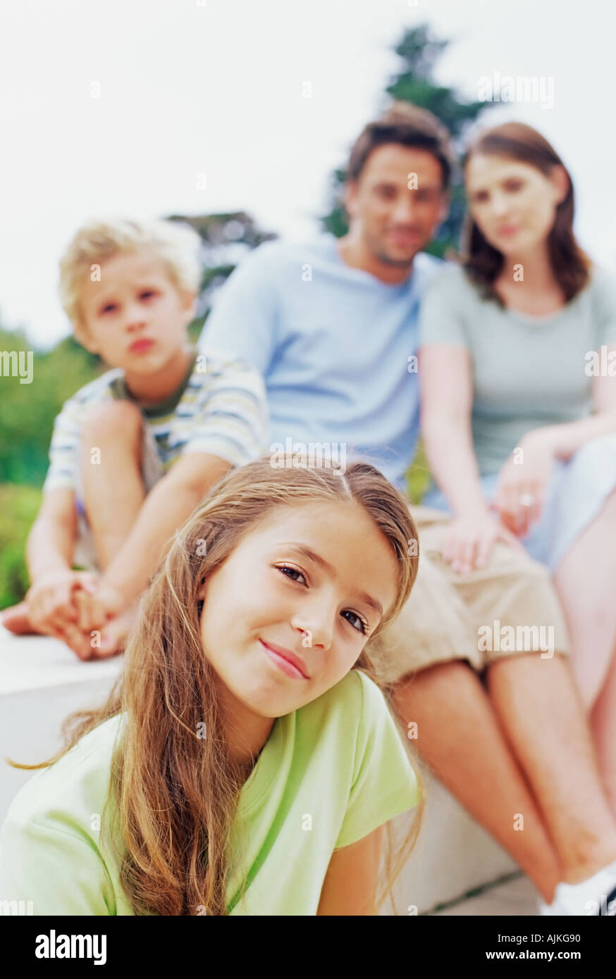 Girl and her family Stock Photo - Alamy