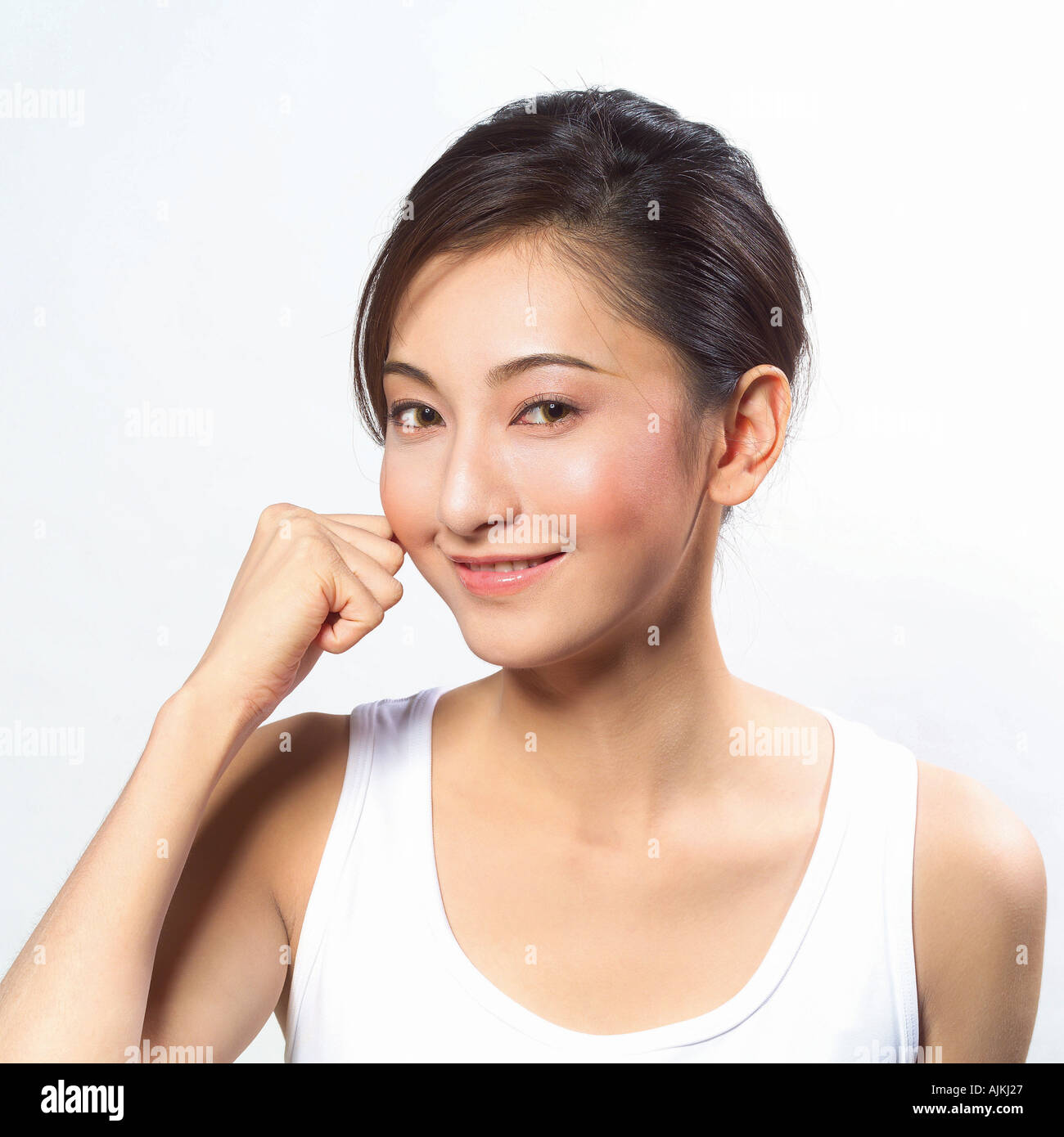 Pinching cheek hi-res stock photography and images - Alamy