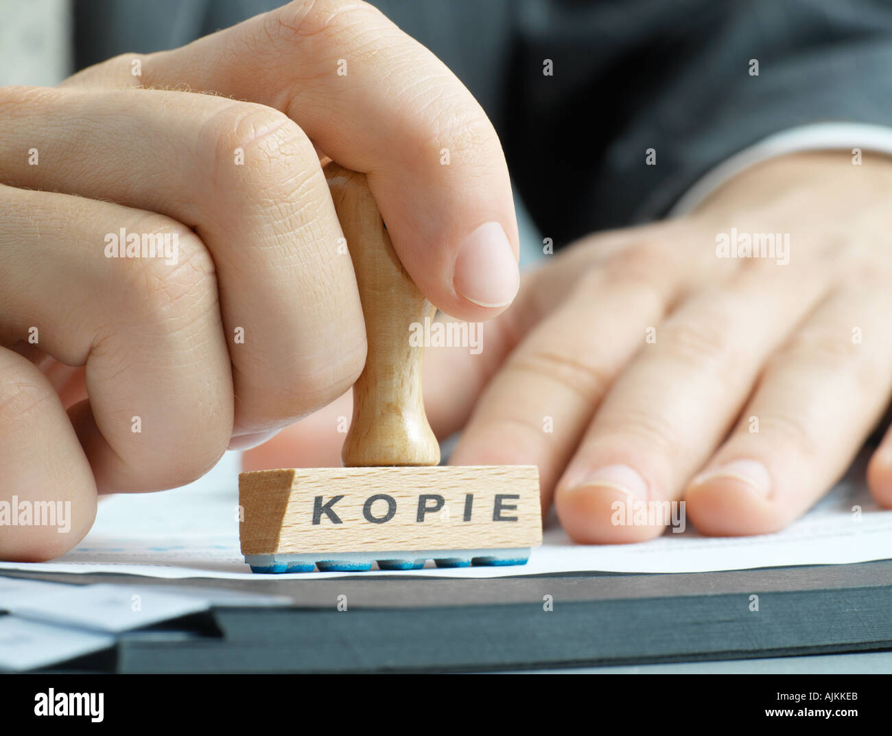 Hand using stamp hi-res stock photography and images - Alamy