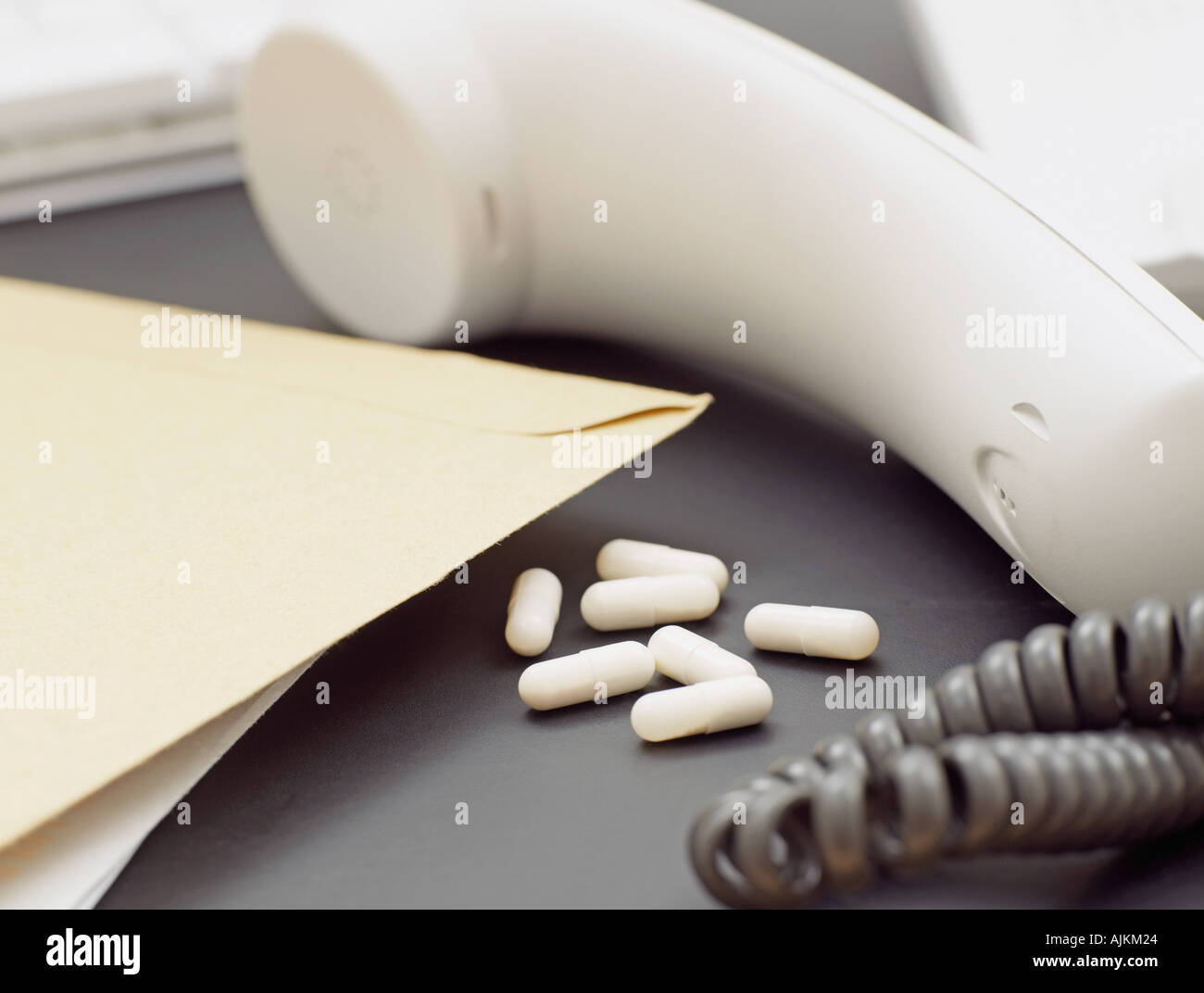 Drugs by a telephone receiver Stock Photo - Alamy