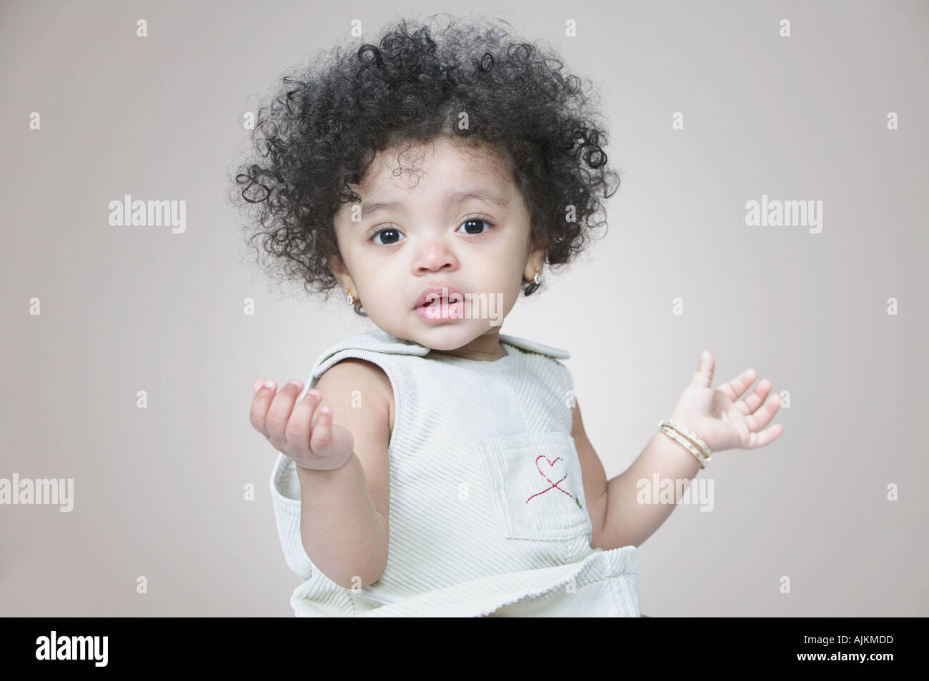 Innocent looking girl Stock Photo - Alamy