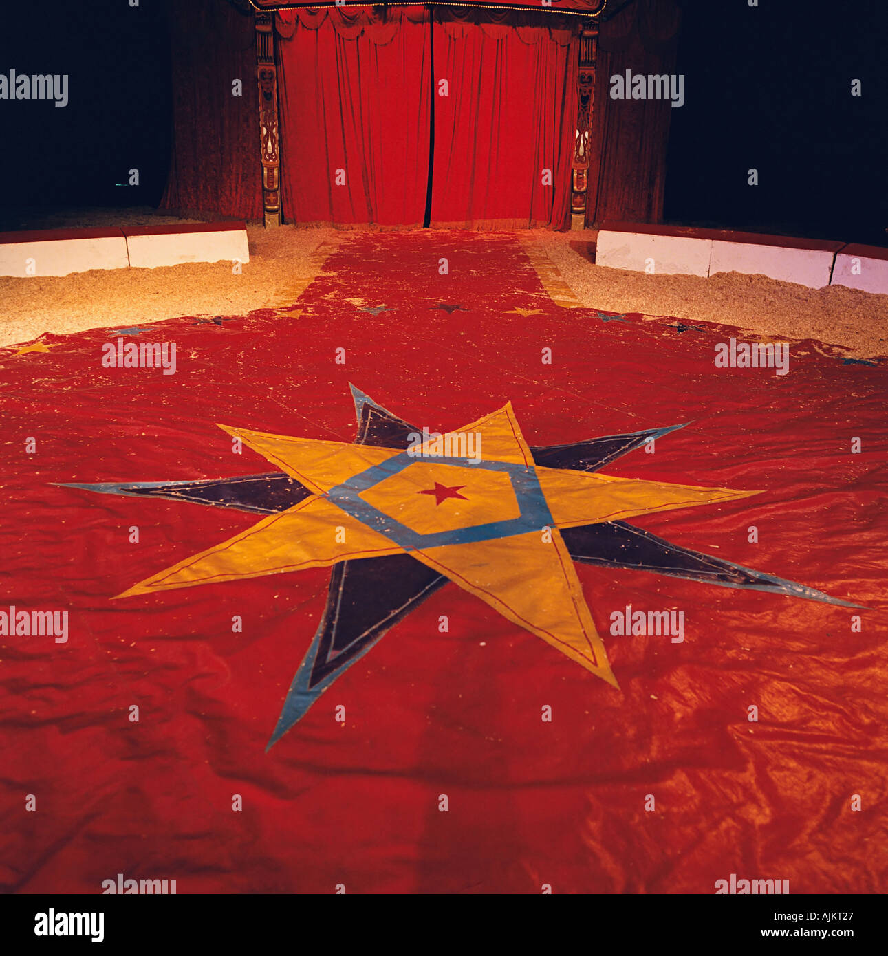 Star shape on circus tent floor Stock Photo - Alamy