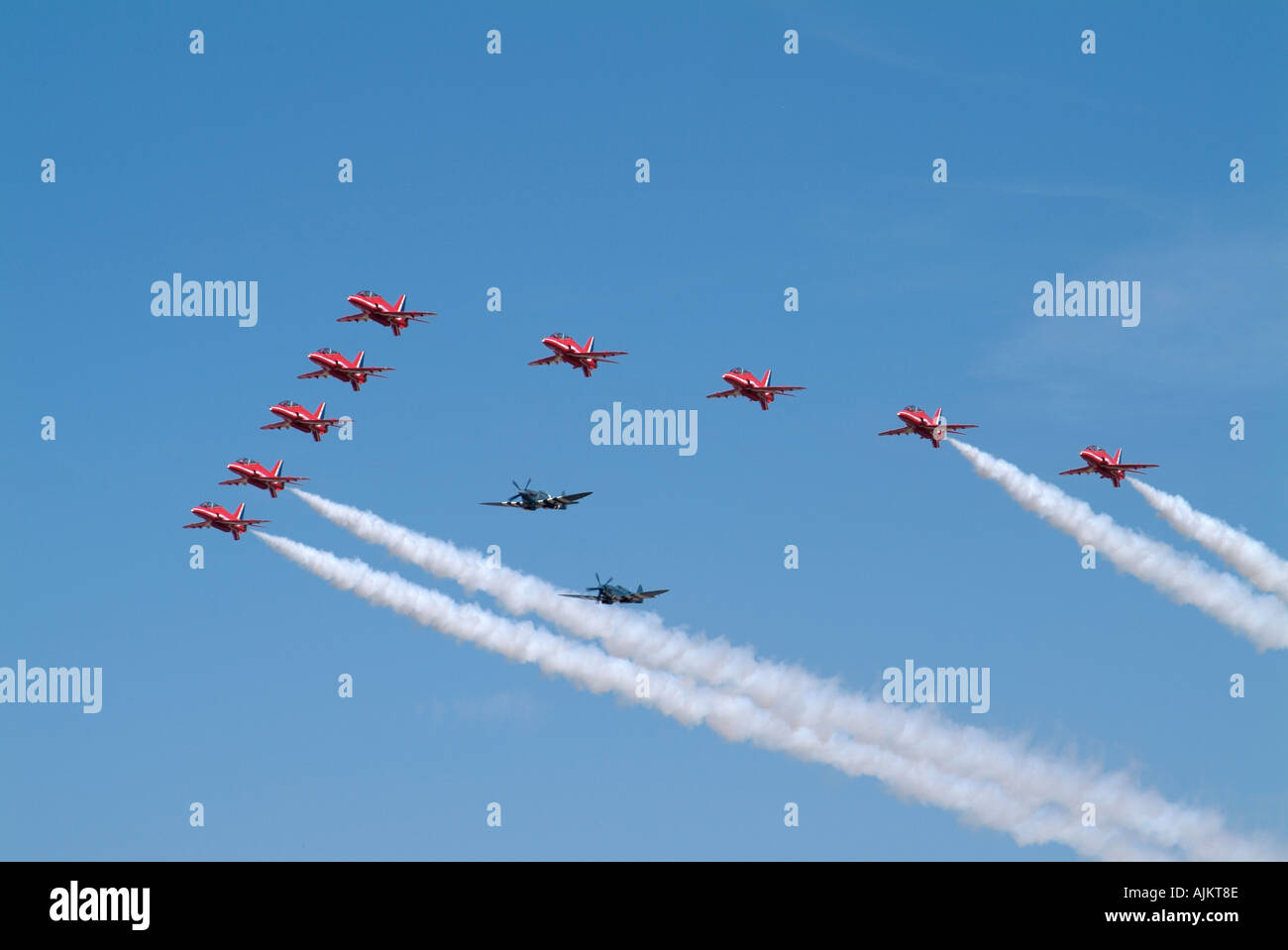 Spitfires with red arrows hi-res stock photography and images - Alamy