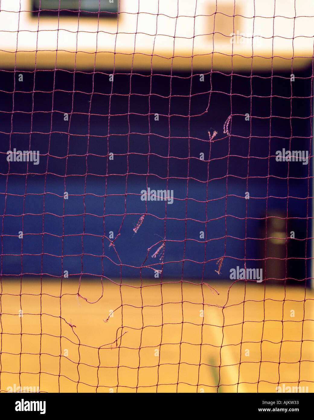 Torn net hole in net hi-res stock photography and images - Alamy