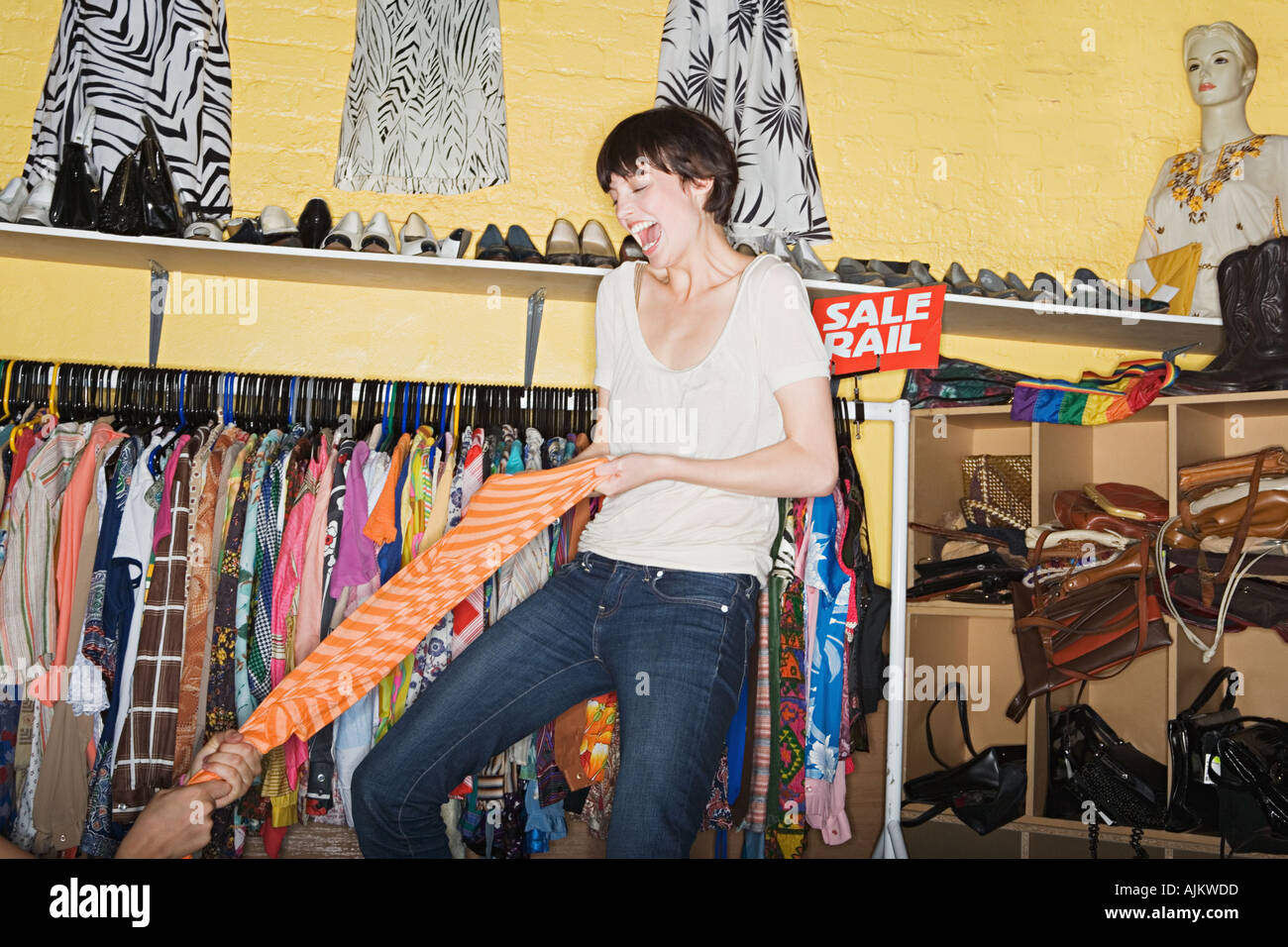 Women fighting for trousers hi-res stock photography and images - Alamy