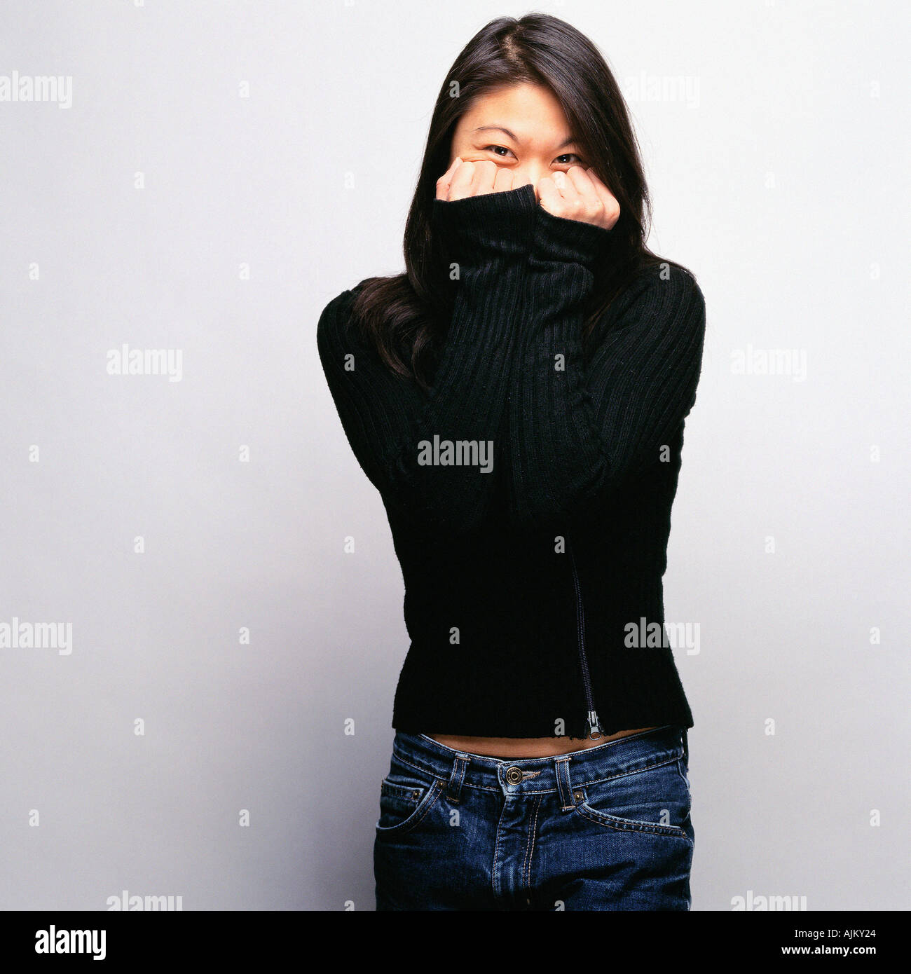Woman covering face Stock Photo - Alamy
