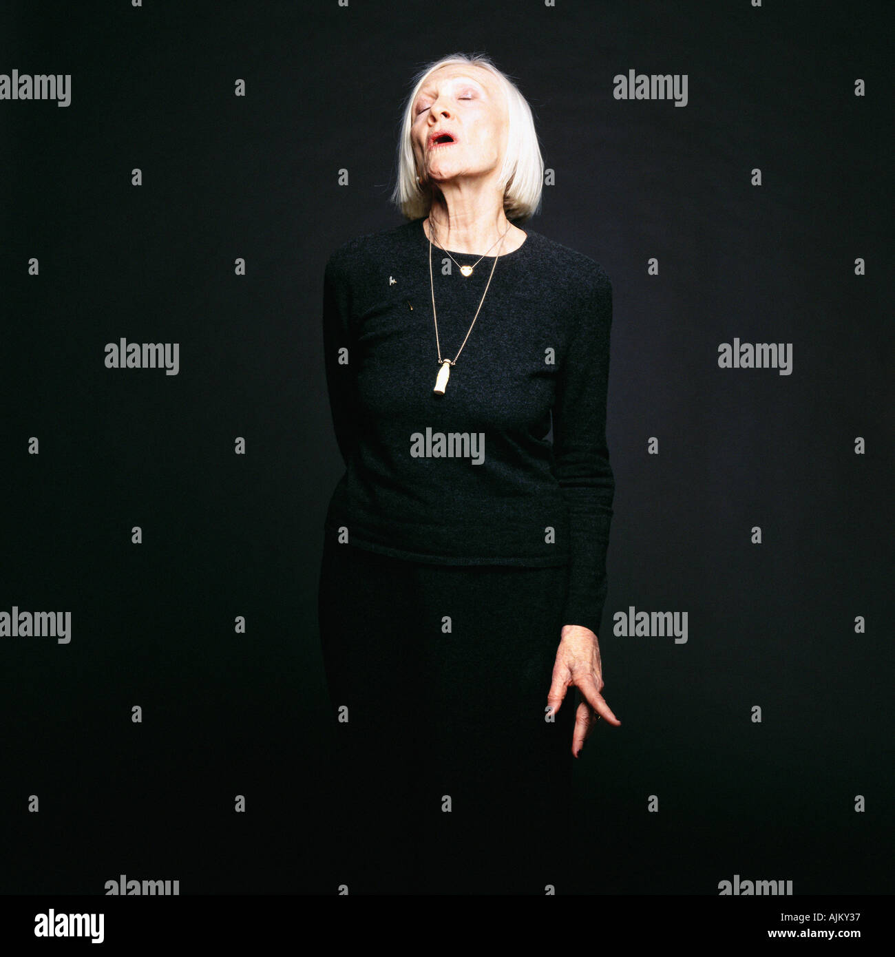 Older woman singing hi-res stock photography and images - Alamy