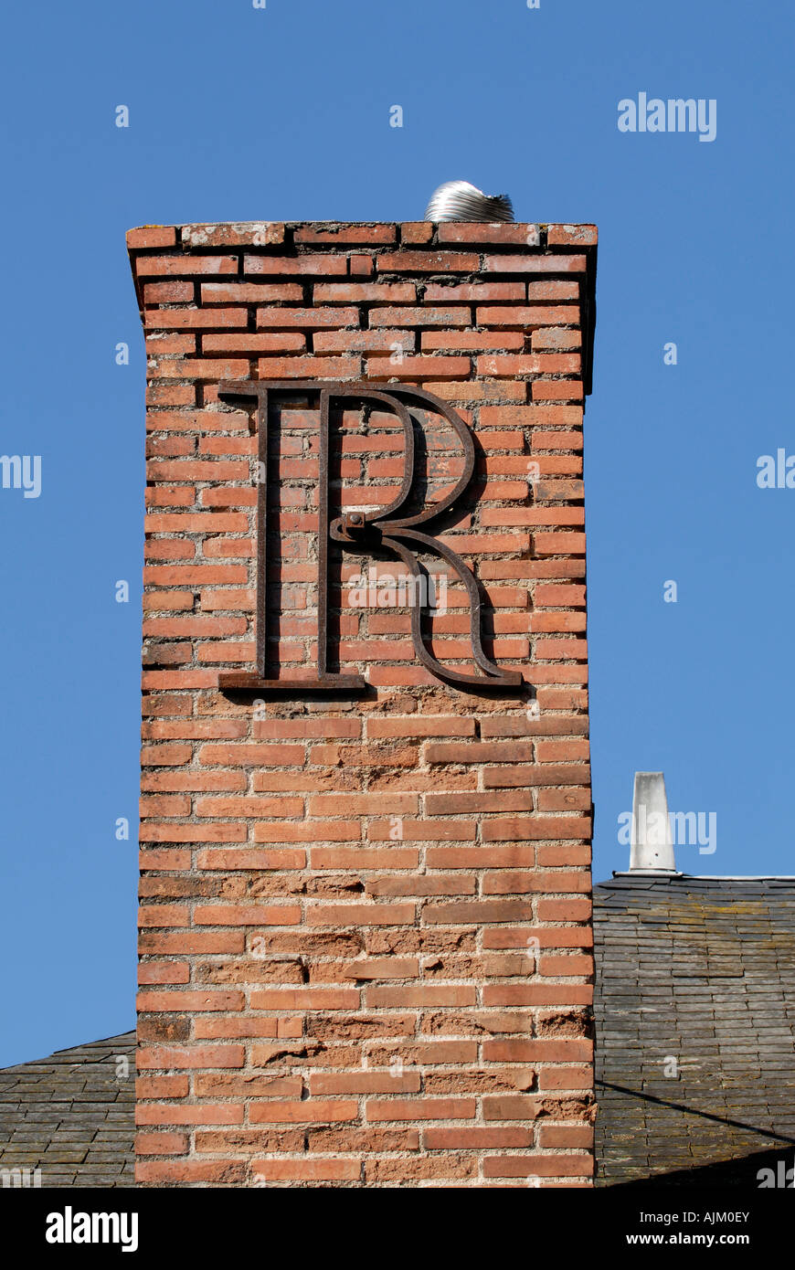 "R" reinforcing letter on chimney stack, Tournan St Pierre, Indre-et ...