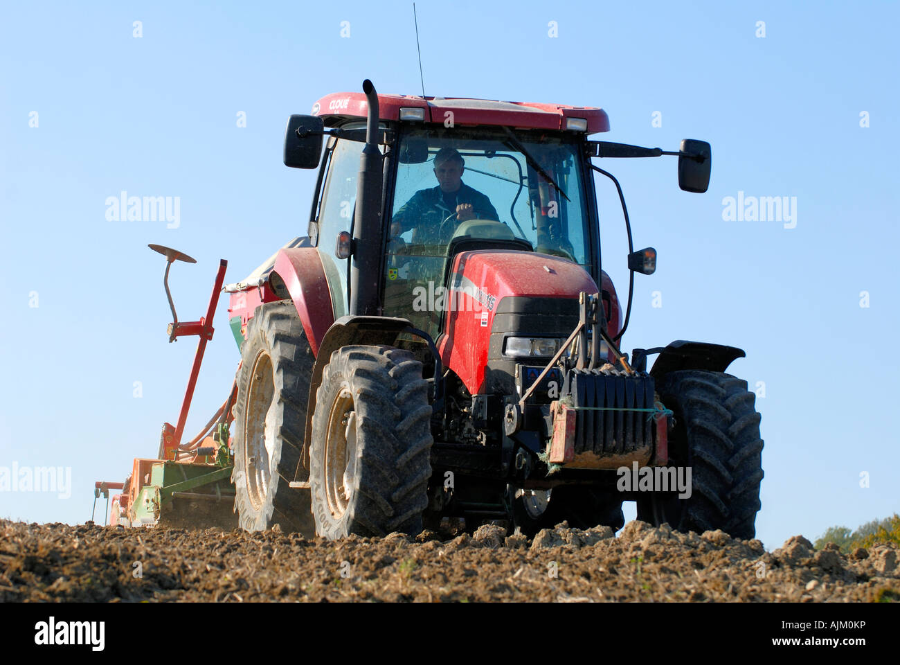 Tractor sowing seed hi-res stock photography and images - Alamy
