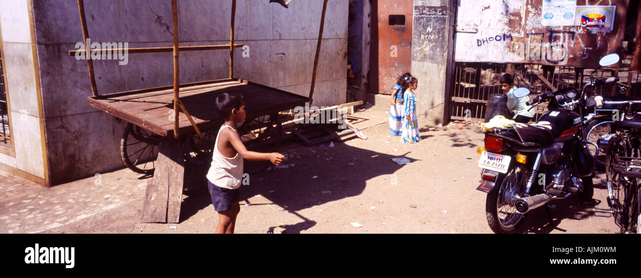 young boy outside house, Mumbai, India Stock Photo - Alamy