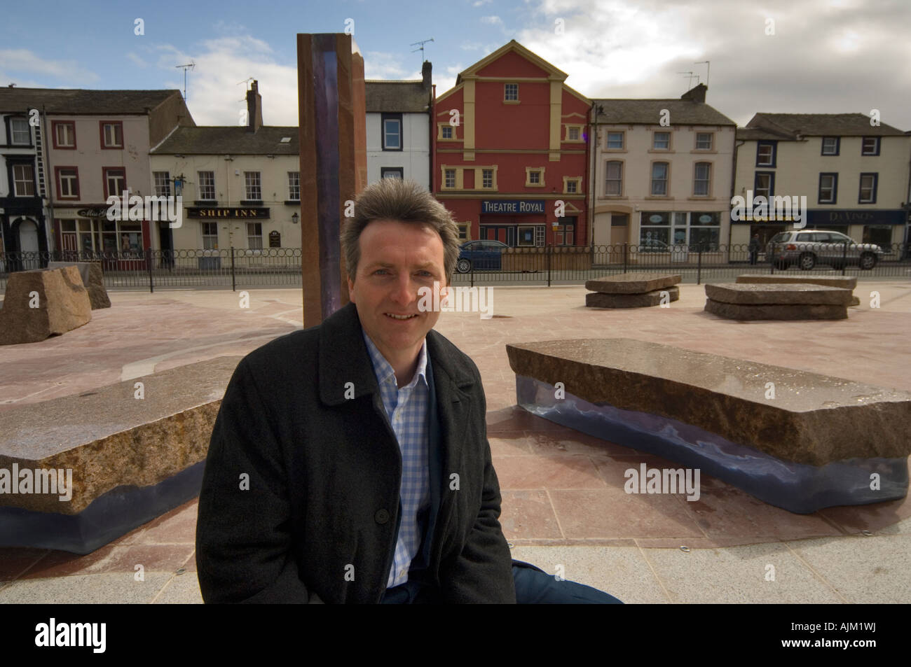 British Sculptor Simon Hitchens sitting on one of his installation at ...