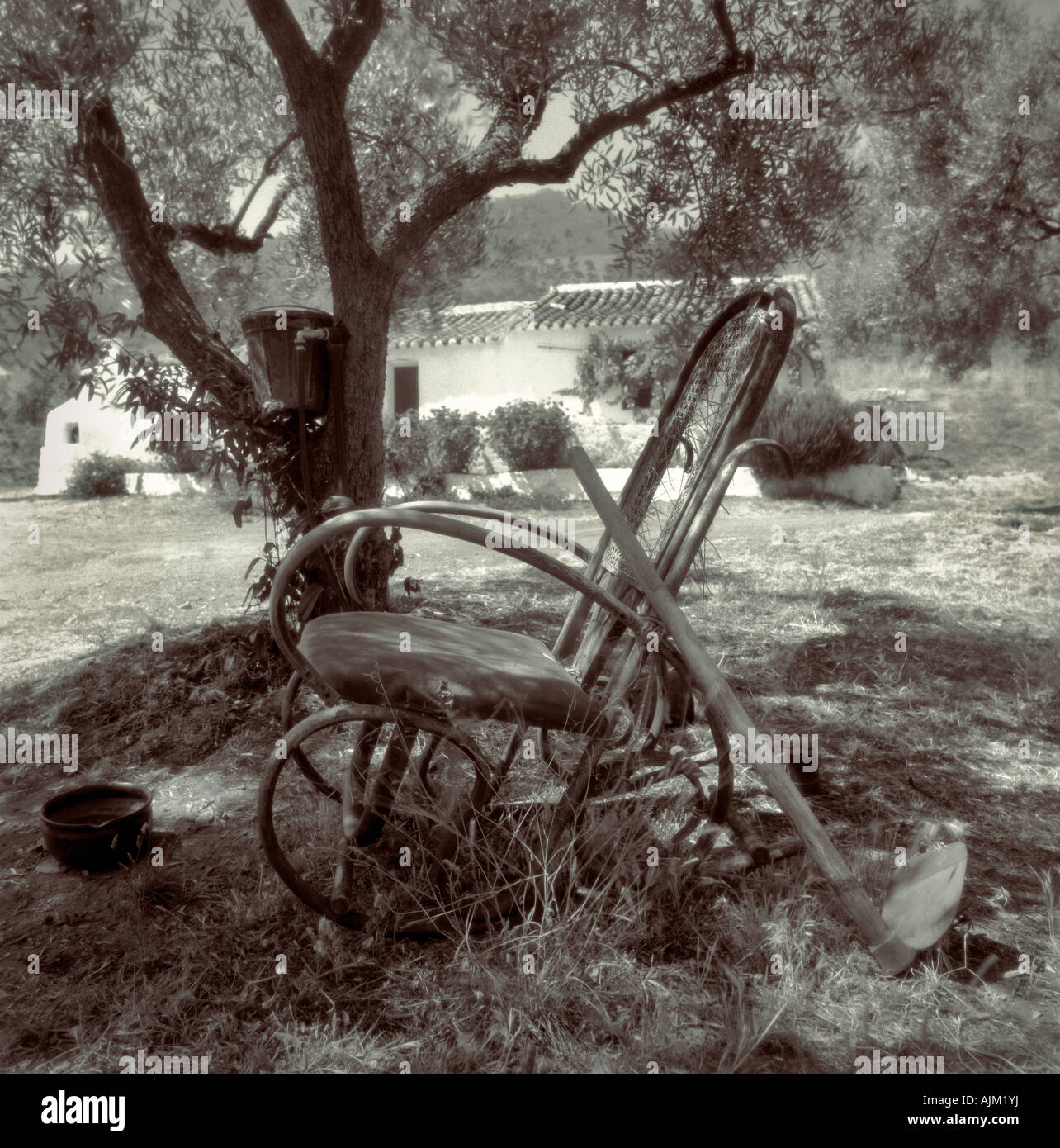 Romantic rural scene with rocking chair tree and villa Competa Spain ...