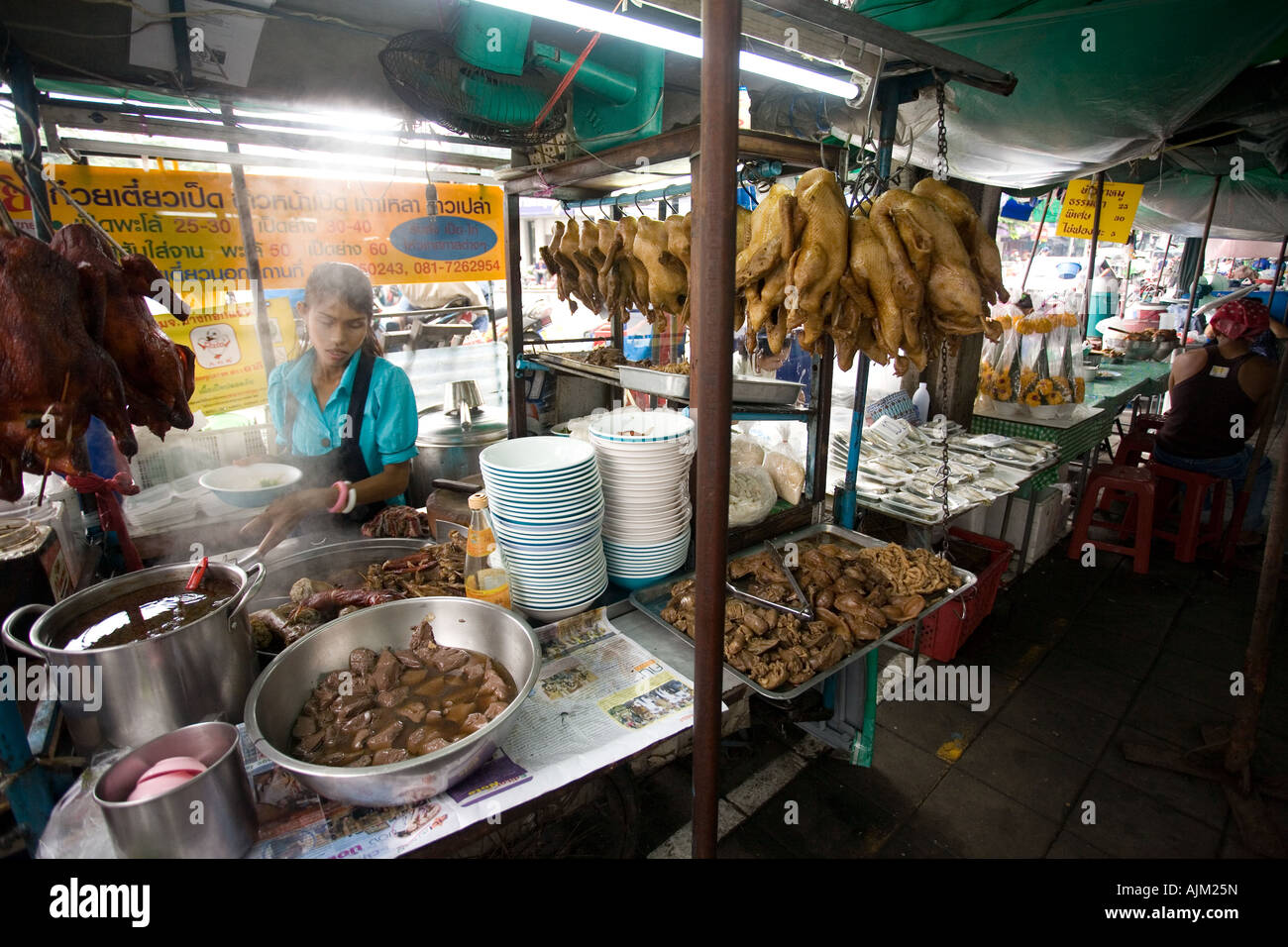 Street hawker selling chicken dishes Thailand Stock Photo - Alamy