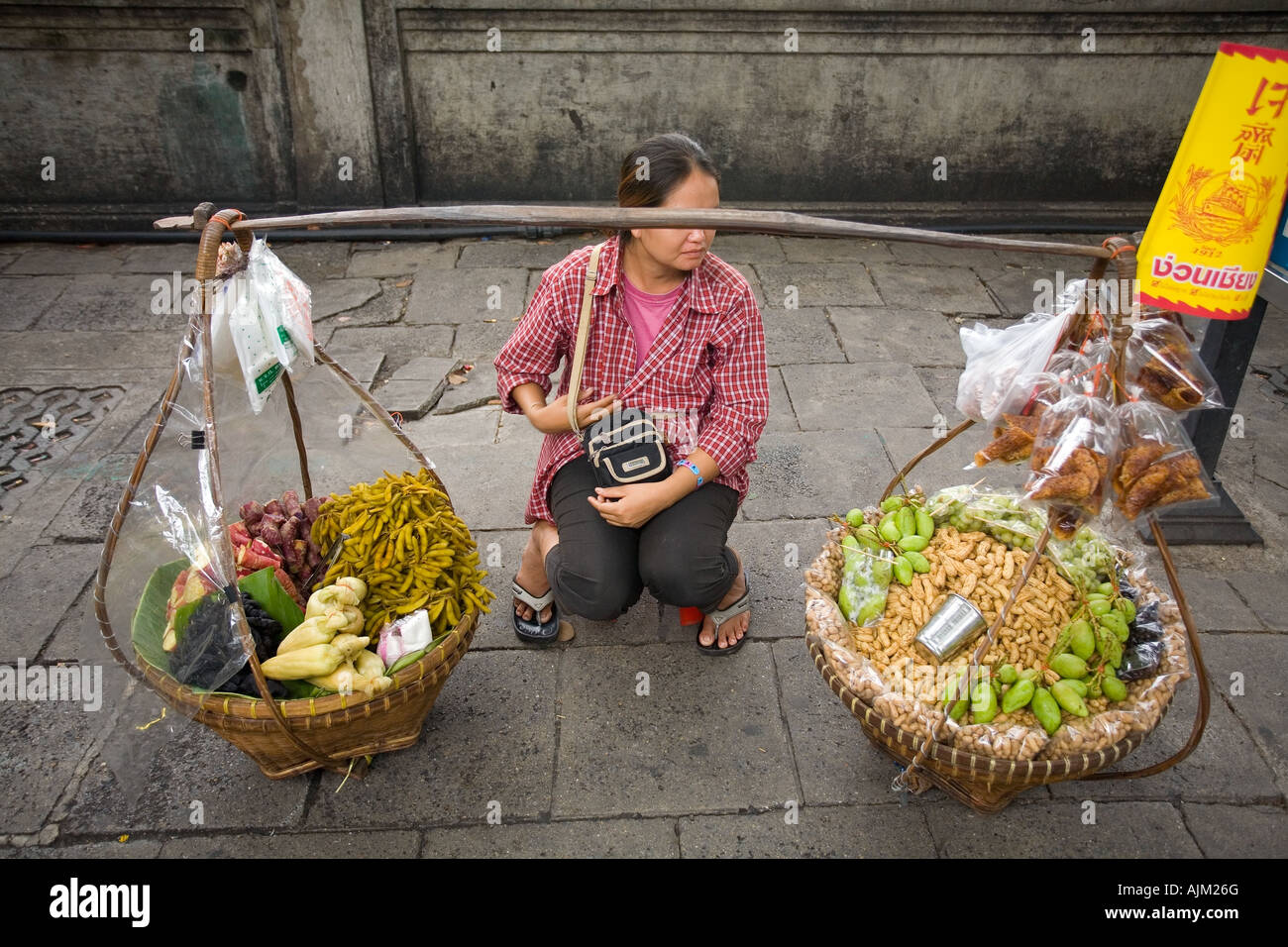 Street hawker selling fruits Thailand Stock Photo - Alamy