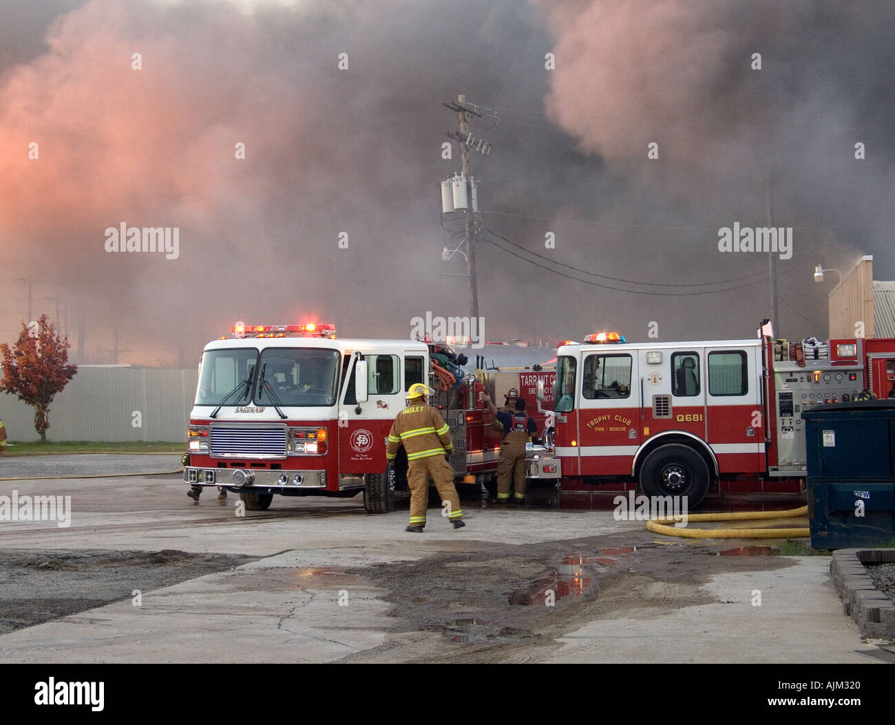 Fire trucks arriving hi-res stock photography and images - Alamy