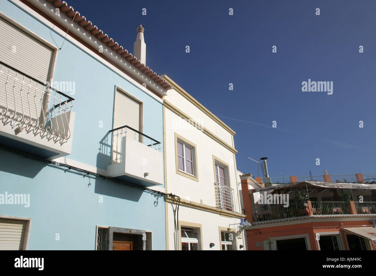 Side street Alvor Algarve Portugal Stock Photo - Alamy