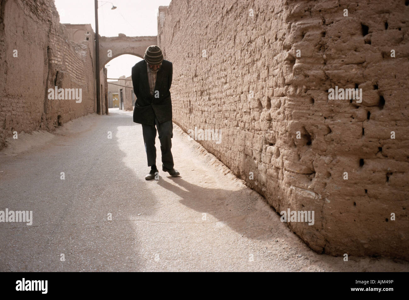 old iranian walking along the street, Iran, Yazd Stock Photo - Alamy