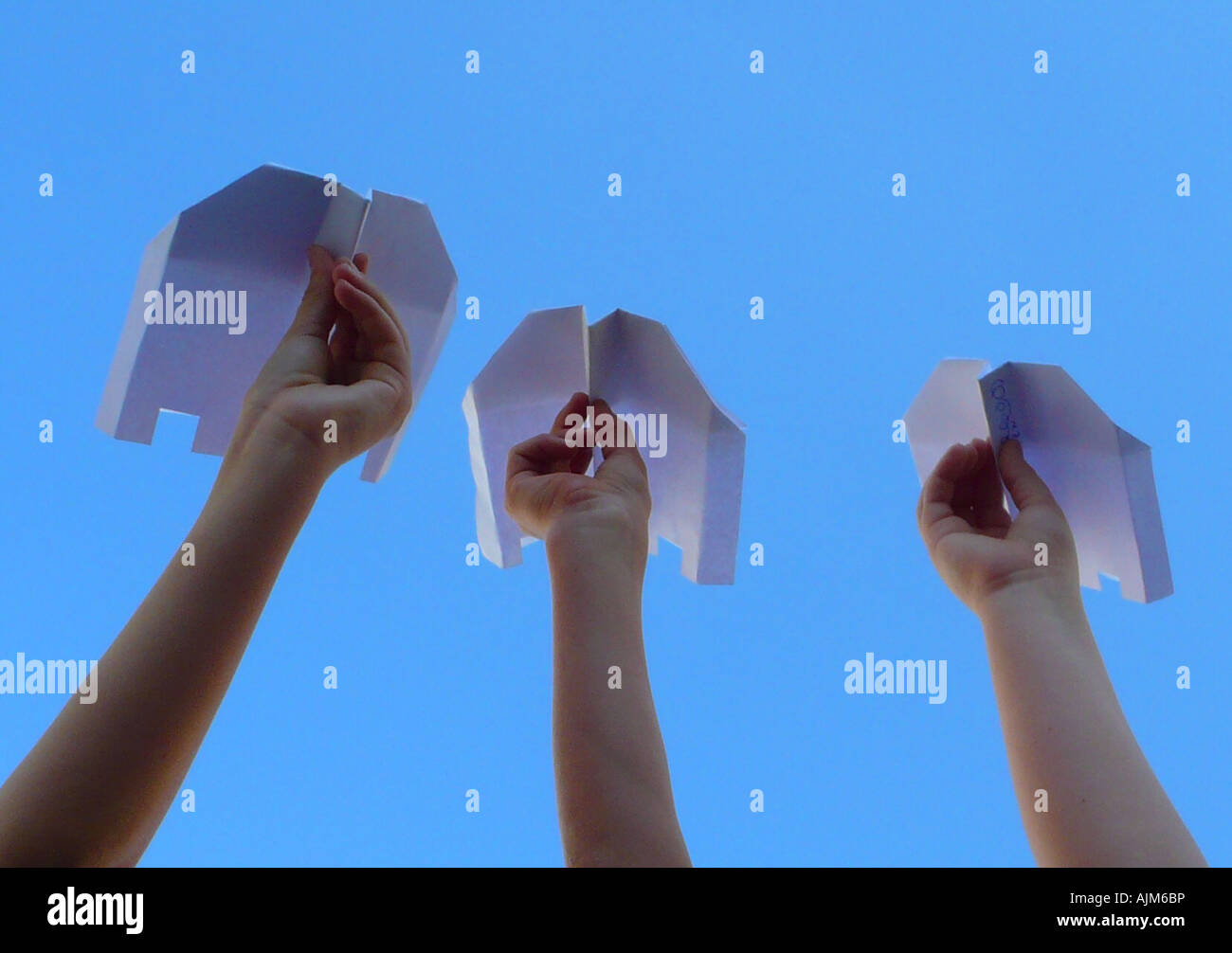 Hands holding paper planes hi-res stock photography and images - Alamy