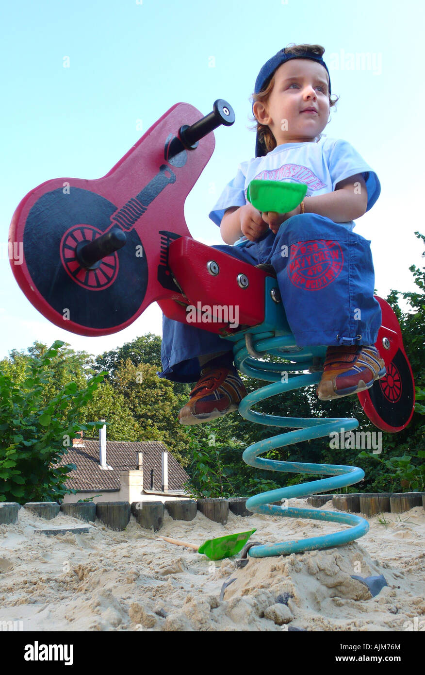 small boy on springer at the playground Stock Photo - Alamy