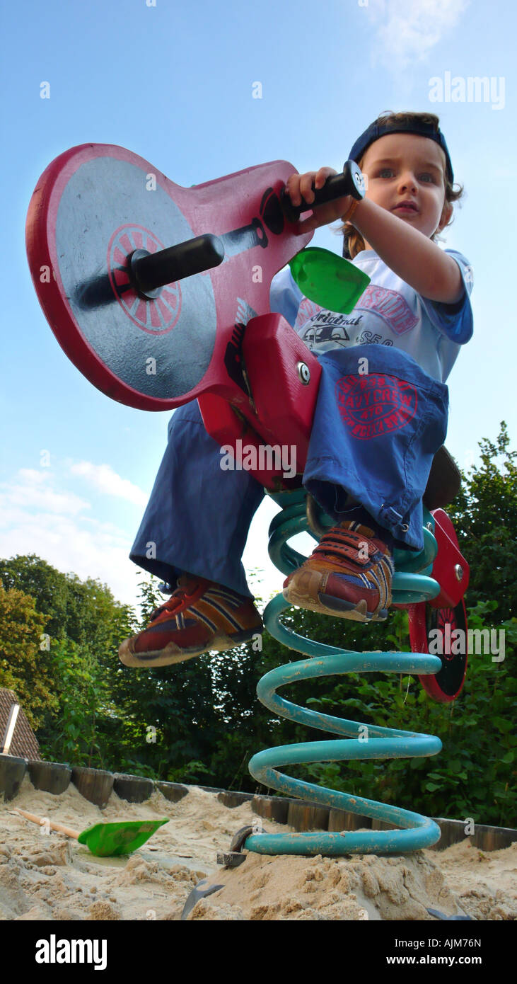 small boy on springer at the playground Stock Photo - Alamy