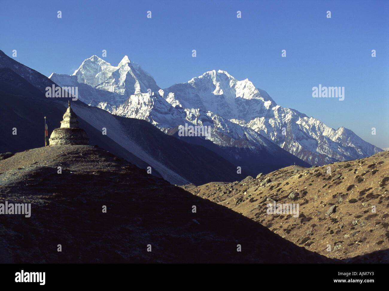 A Buddhist stupa guards the entrance to Dingboche village in Nepal ...