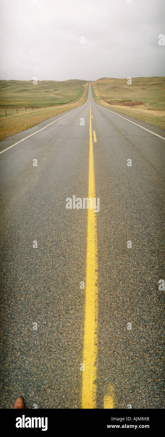 Road stretching into the distance Stock Photo - Alamy