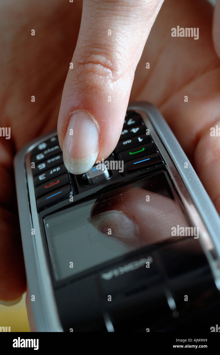A generic of using a mobile phone keypad Stock Photo - Alamy