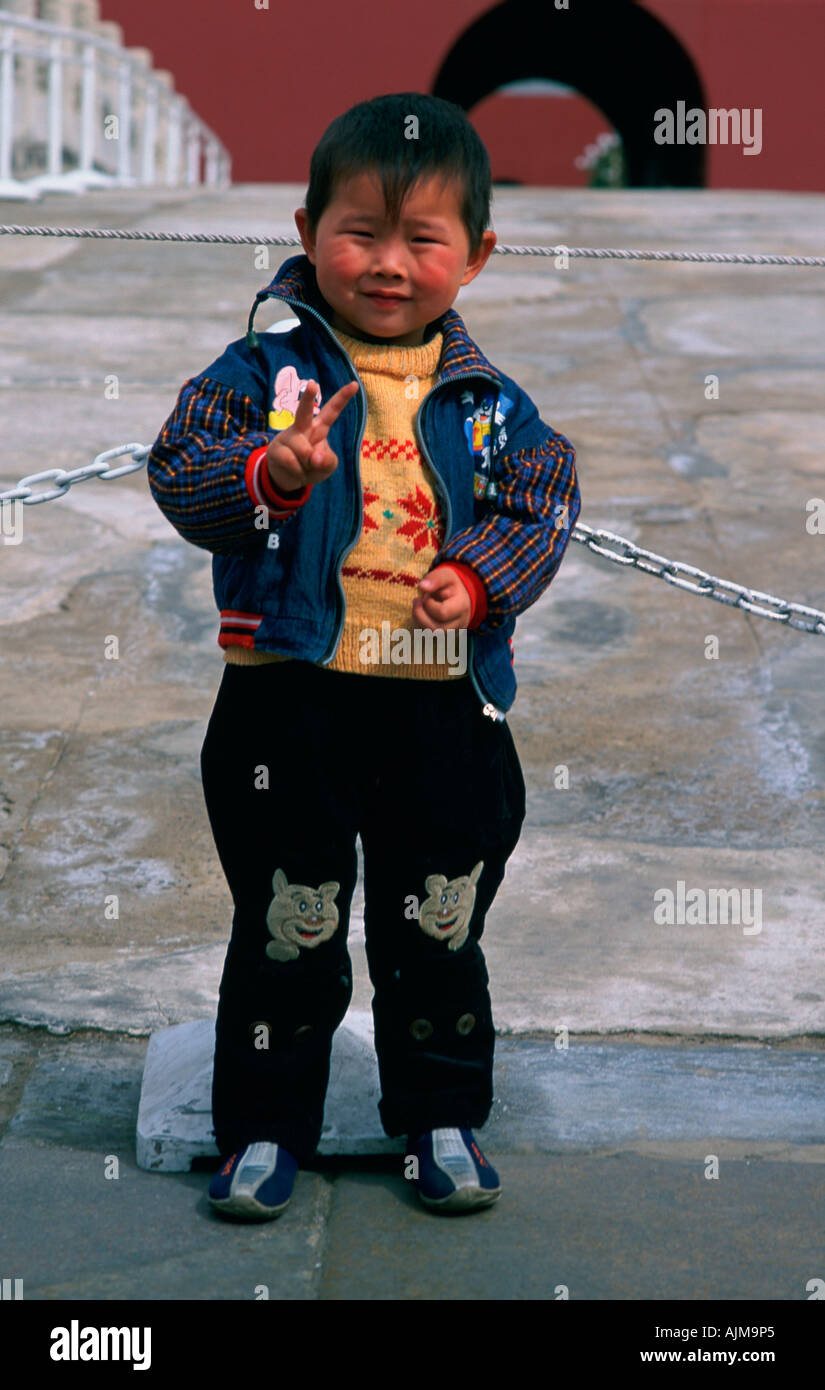 Chinese toddler giving peace sign at Tiananmen Square Beijing China MR ...