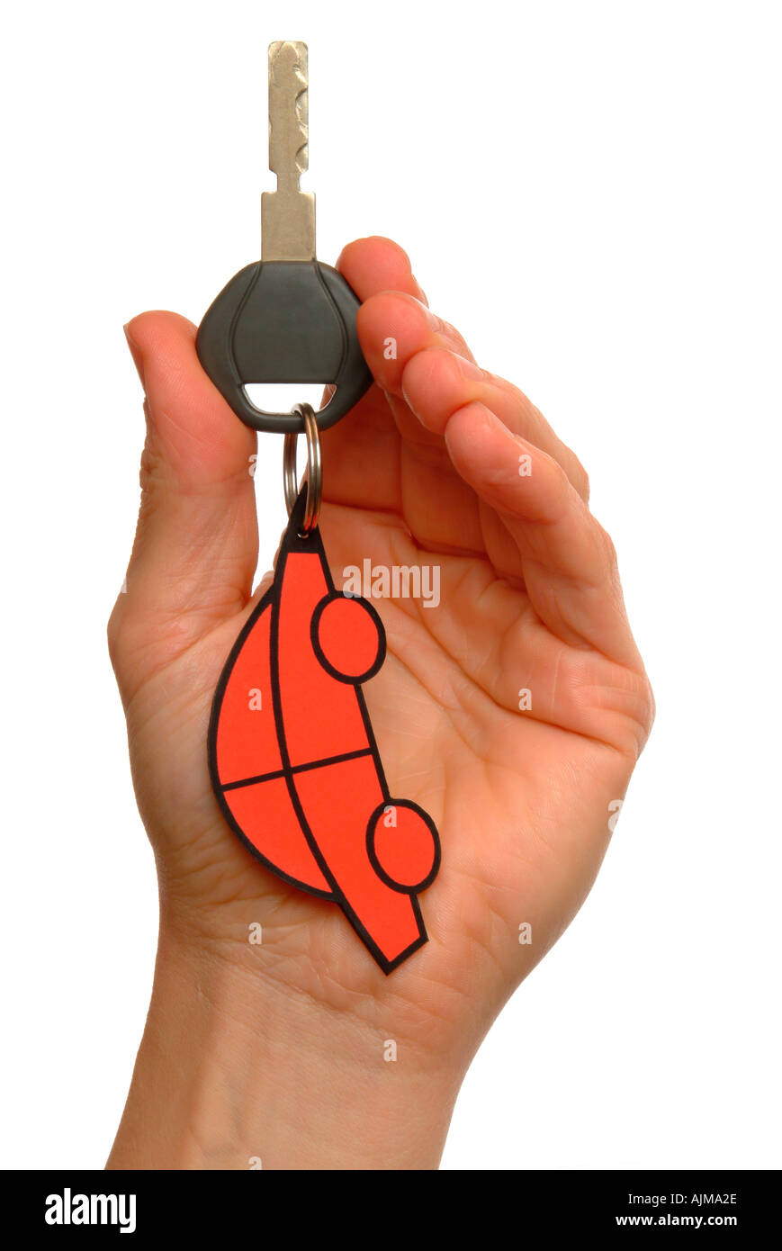 Hand holding car key Stock Photo - Alamy