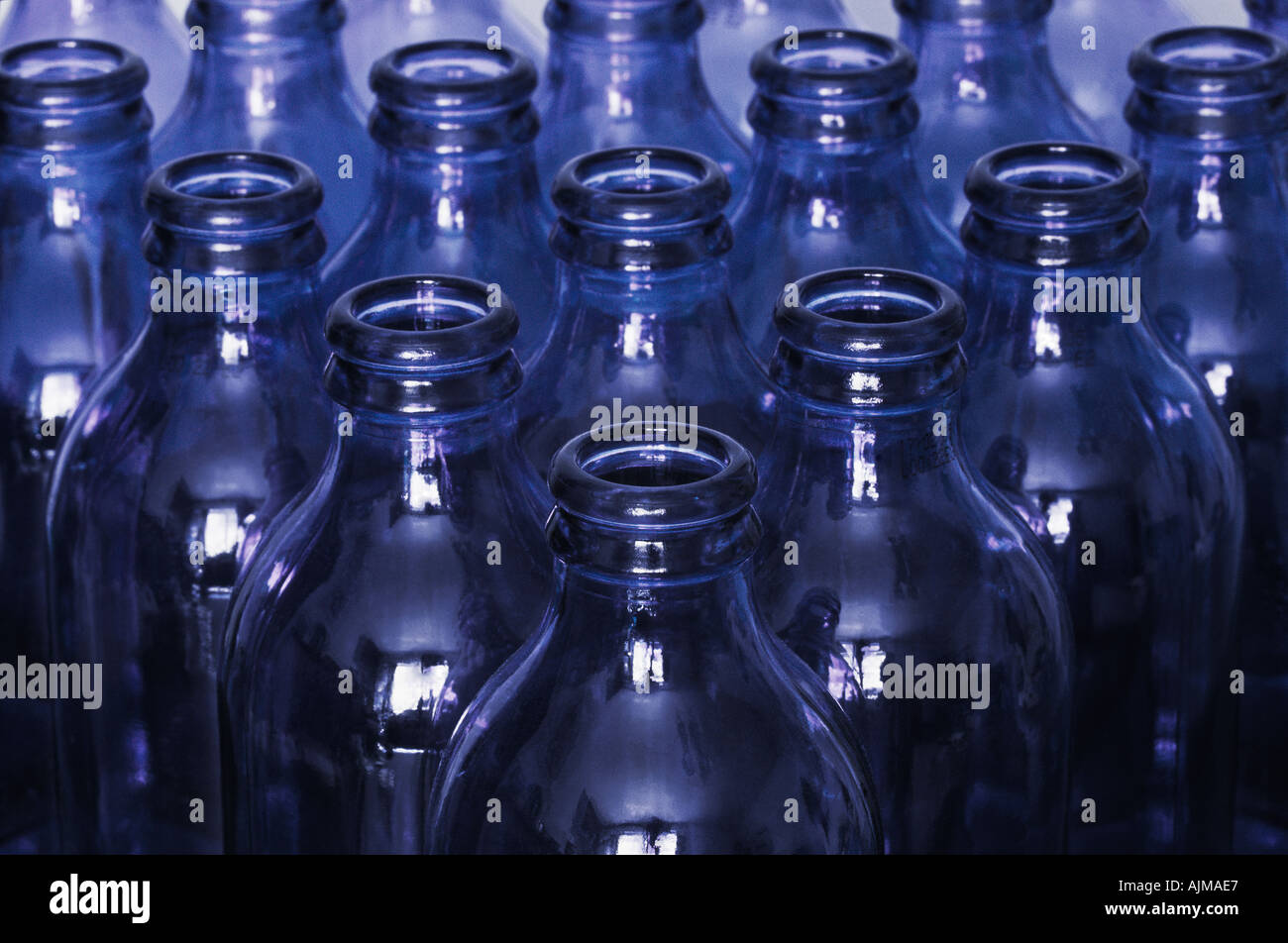 Blue Bottles in Triangular Pattern Stock Photo - Alamy