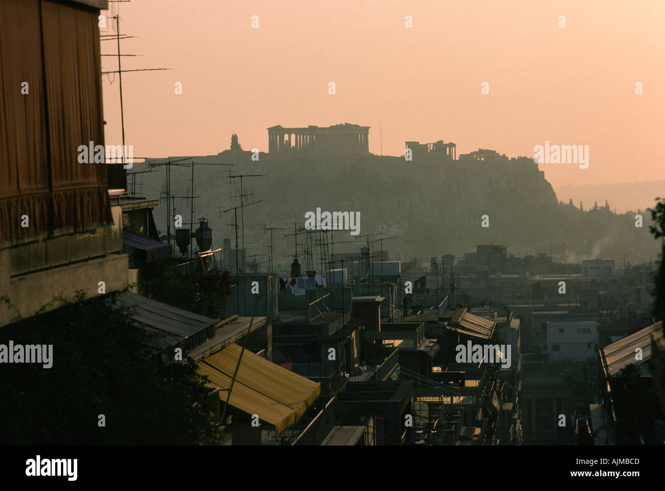 View of the Acropolis over Athens Rooftops at Dusk Stock Photo - Alamy