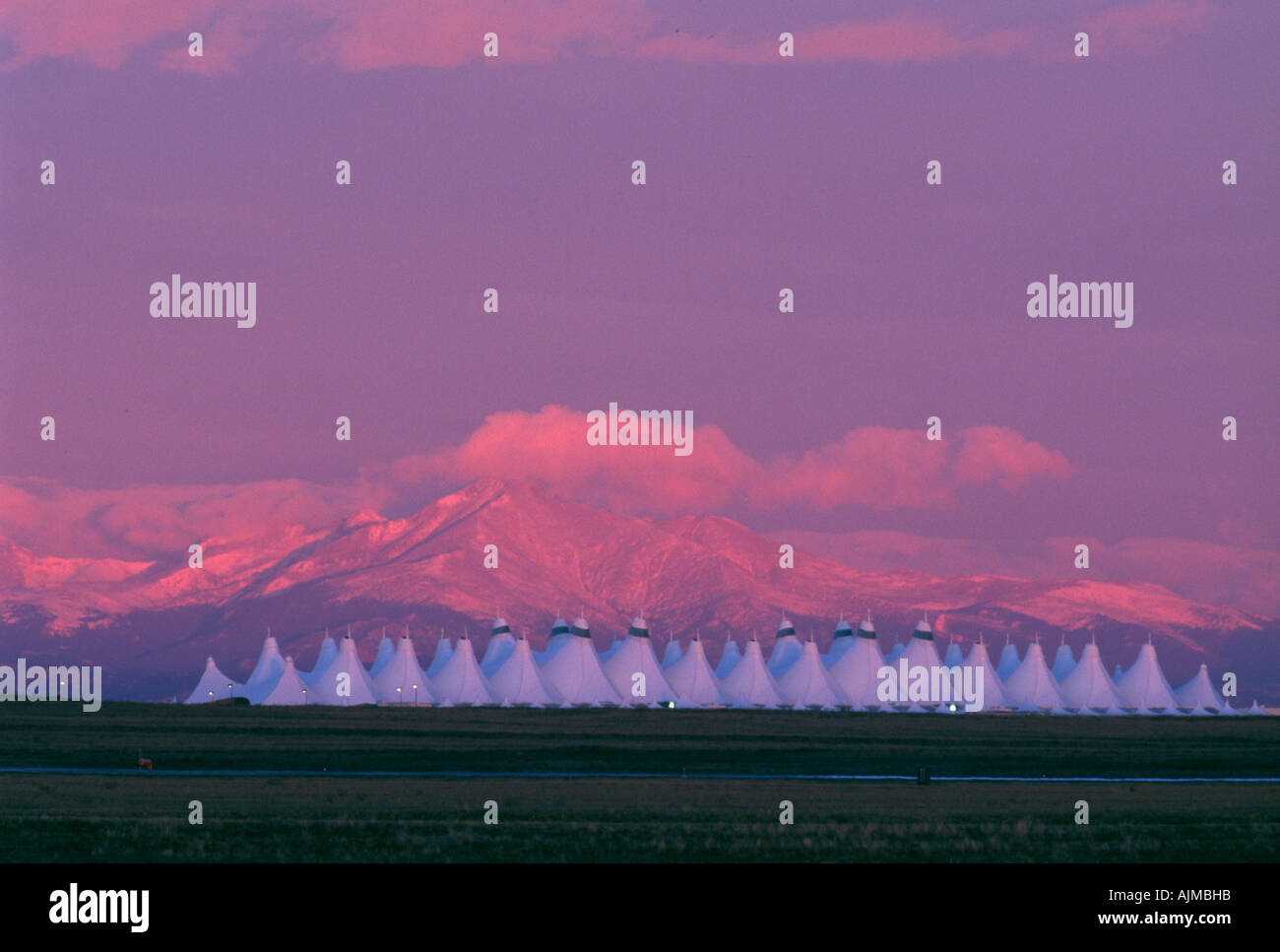 Sunrise light on Front Range with DIA Denver International Airport in ...