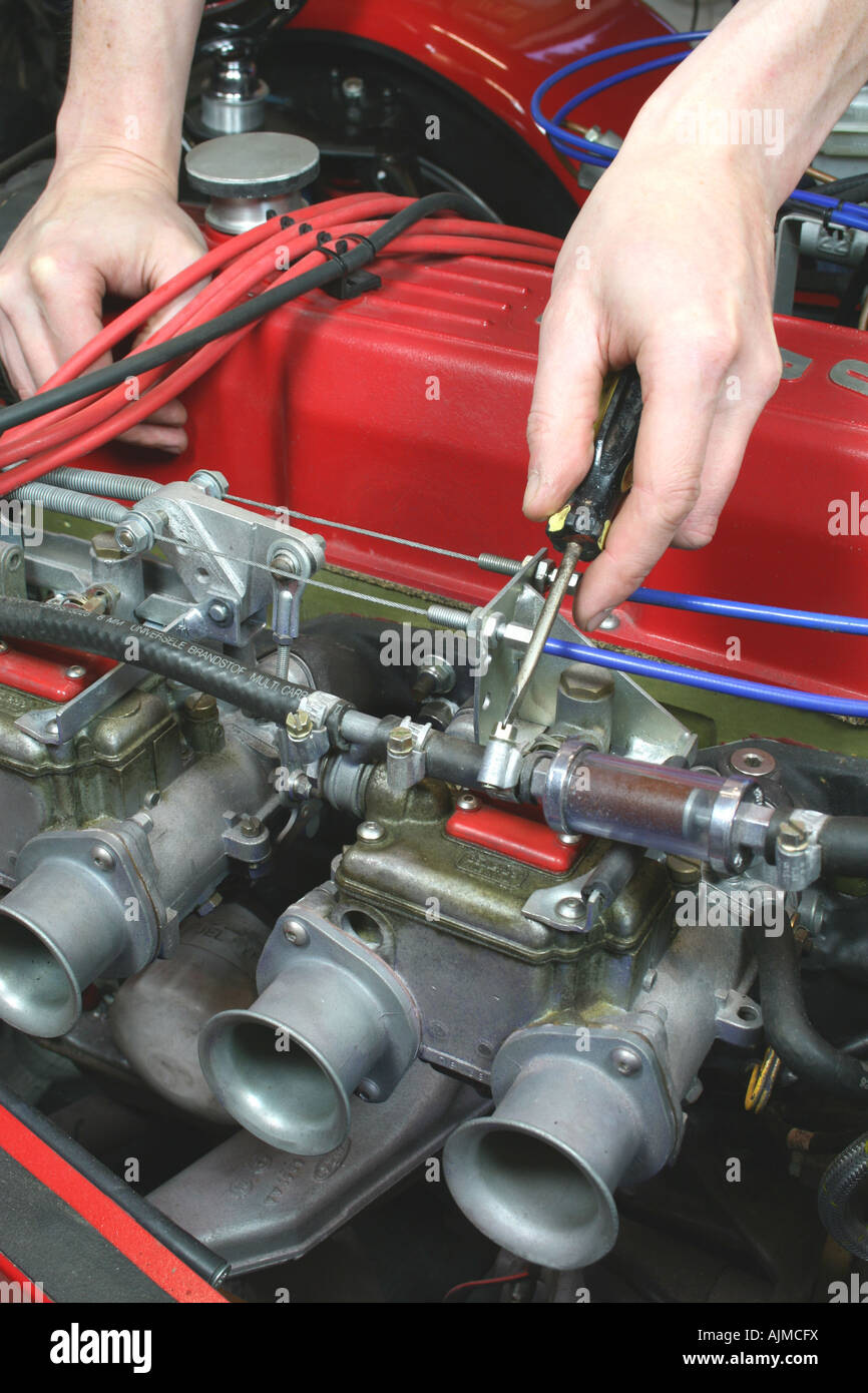 tuning side-draught carburettors on Ford Pinto car engine Stock Photo ...