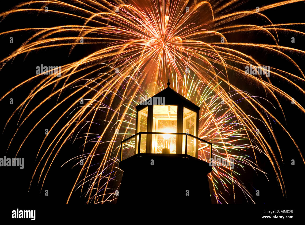 Fourth of July fireworks with lighthouse Stock Photo - Alamy