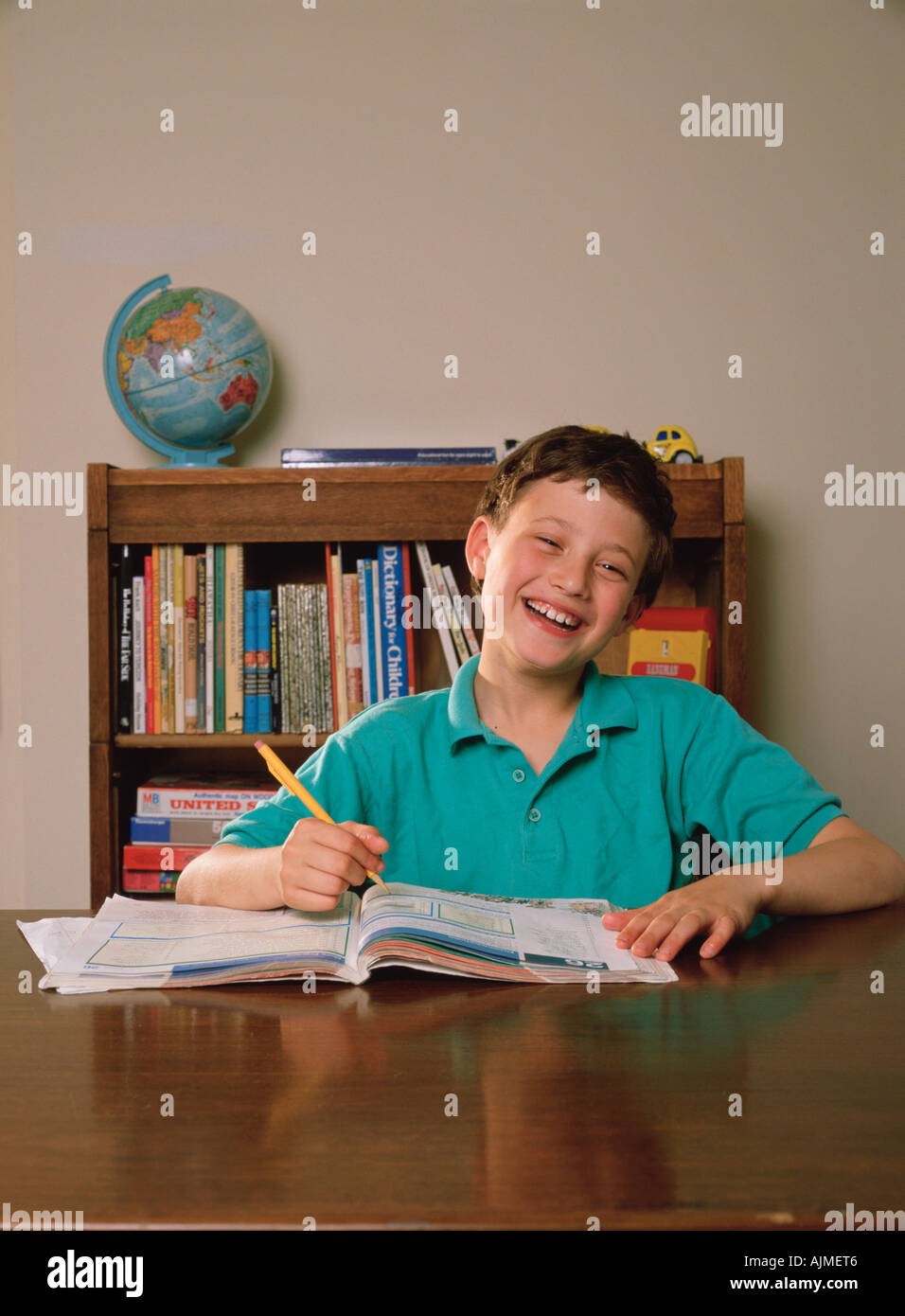 Young boy studying Stock Photo - Alamy Young boy studying Stock Photo - Alamy