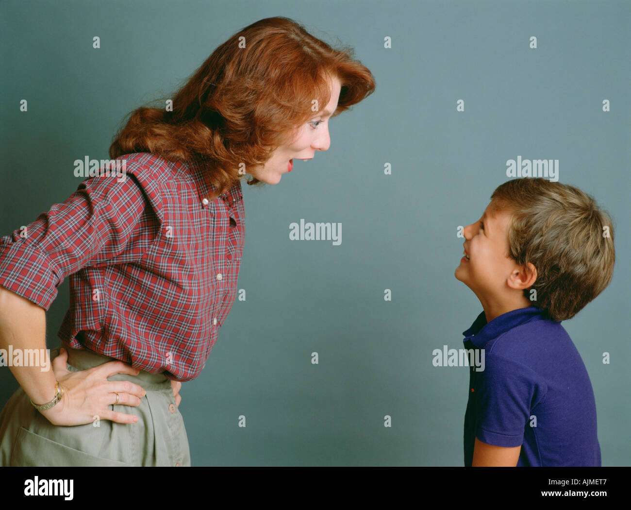 Mother reprimanding her son Stock Photo - Alamy