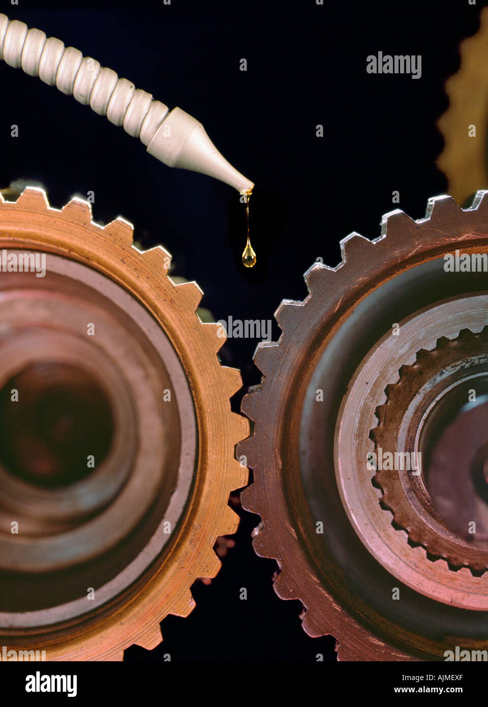 Two interlocked gears Stock Photo - Alamy