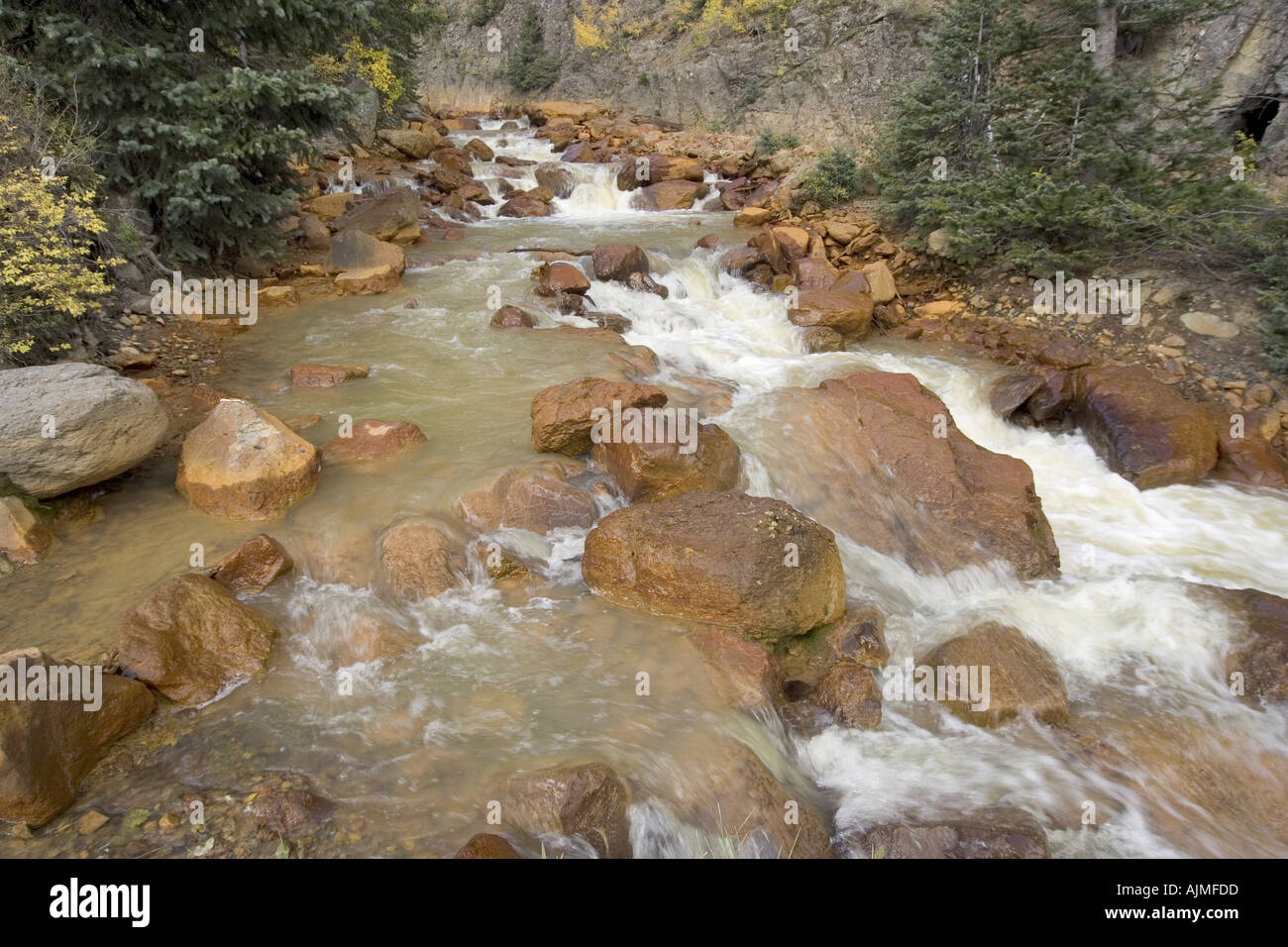 San Miguel watershed mineral coloured rocks Colorado USA waterfall ...