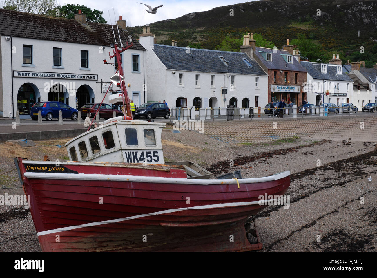 Town Ullapool with beached boat at ebb tide Atlandic coast Highland ...