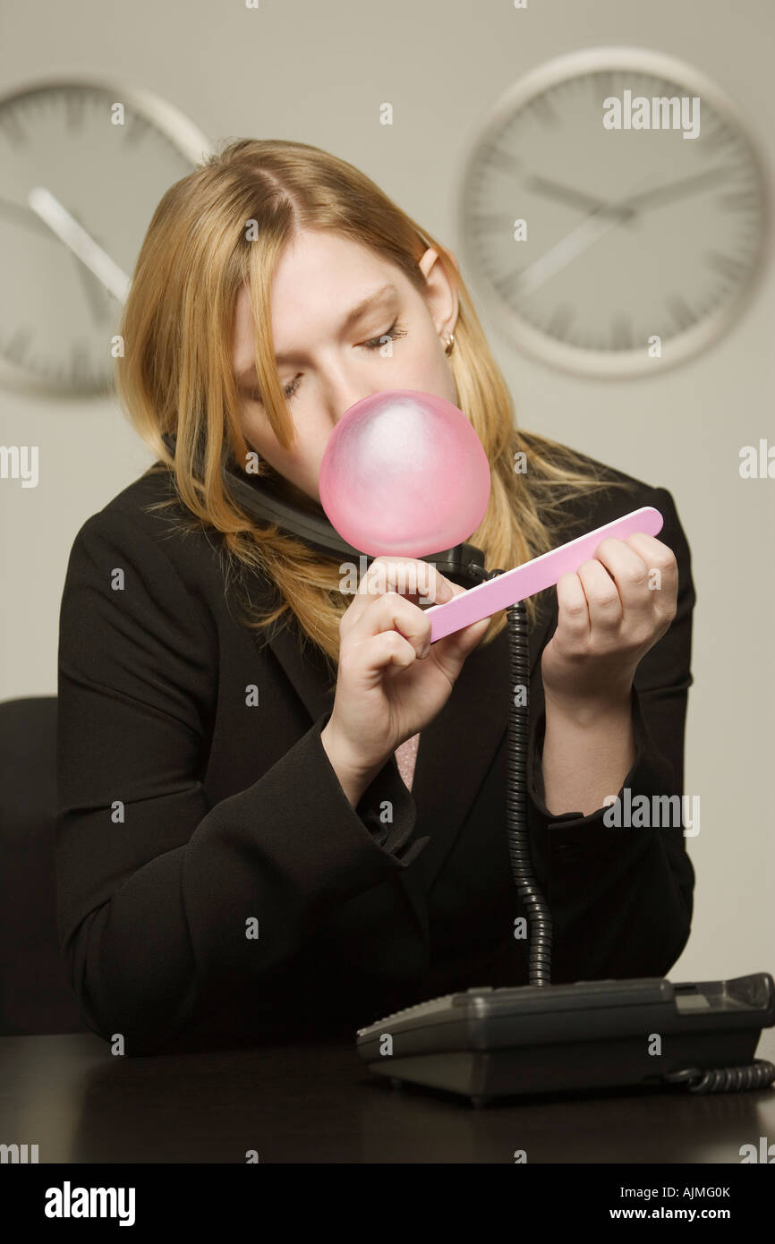 Woman disinterested in work Stock Photo - Alamy Woman disinterested in work Stock Photo - Alamy