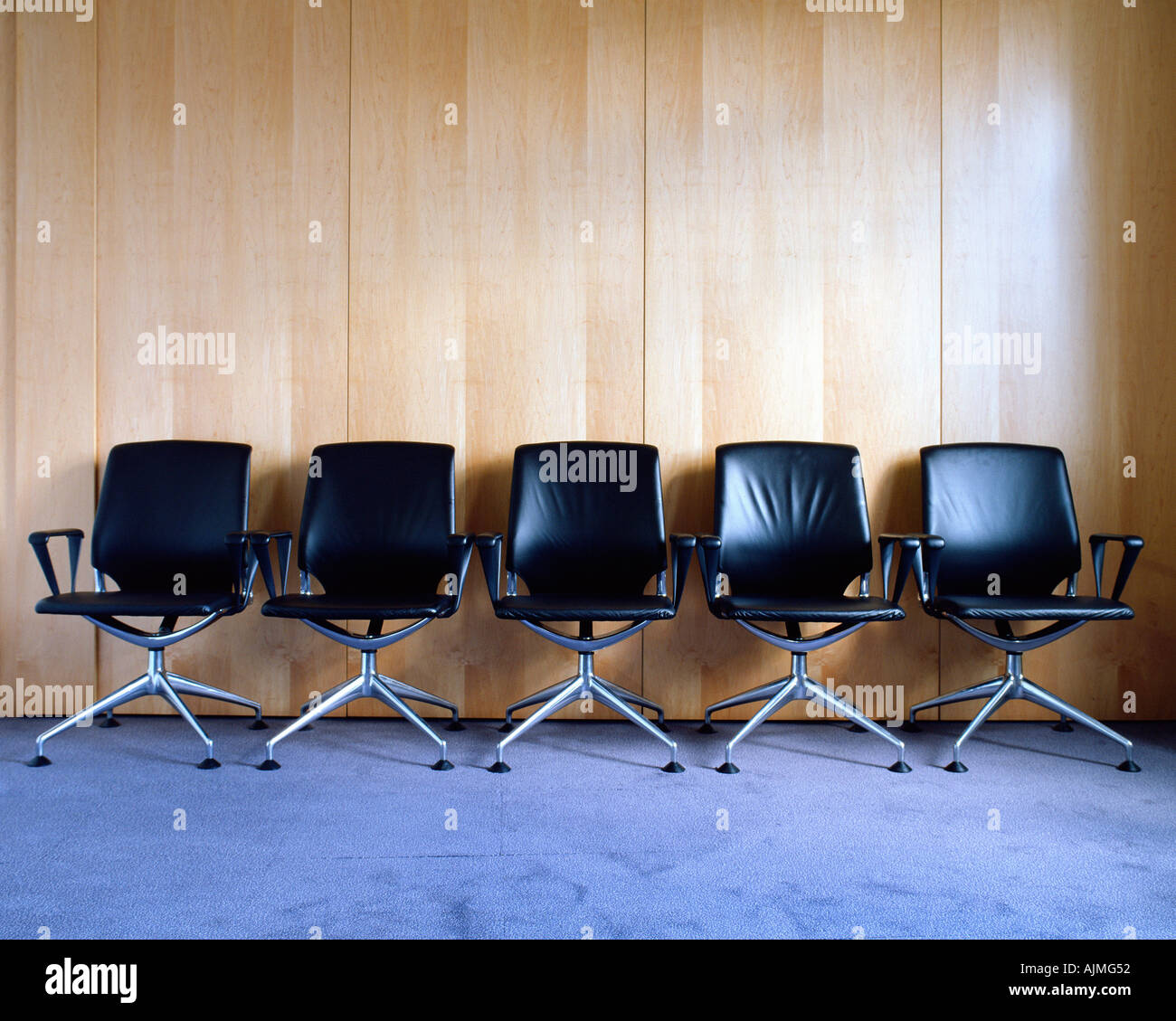 Row of empty office chairs Stock Photo - Alamy