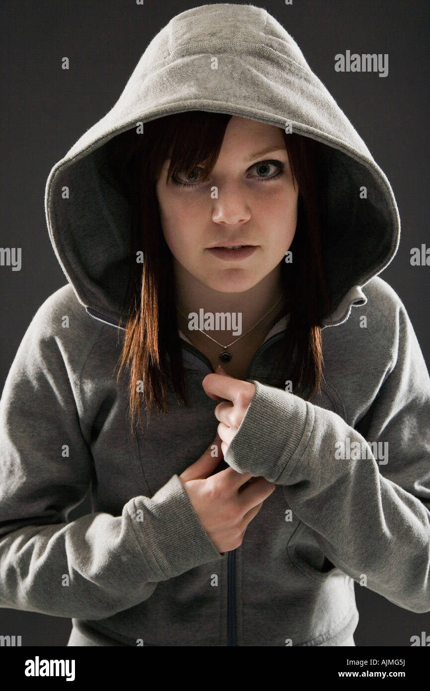 Girl in hooded sweatshirt Stock Photo - Alamy