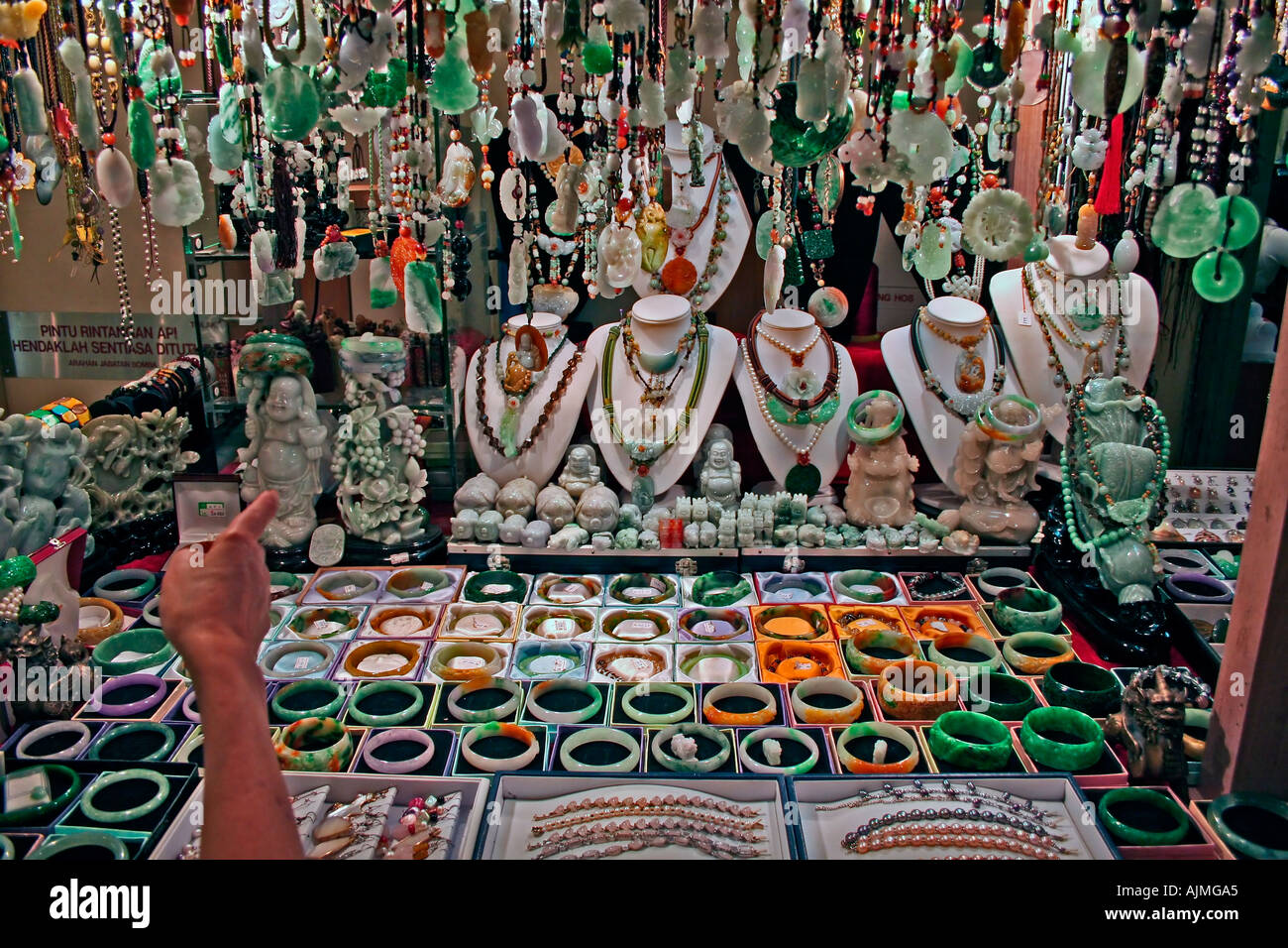 Jade fancy goods for sale market stall Stock Photo - Alamy