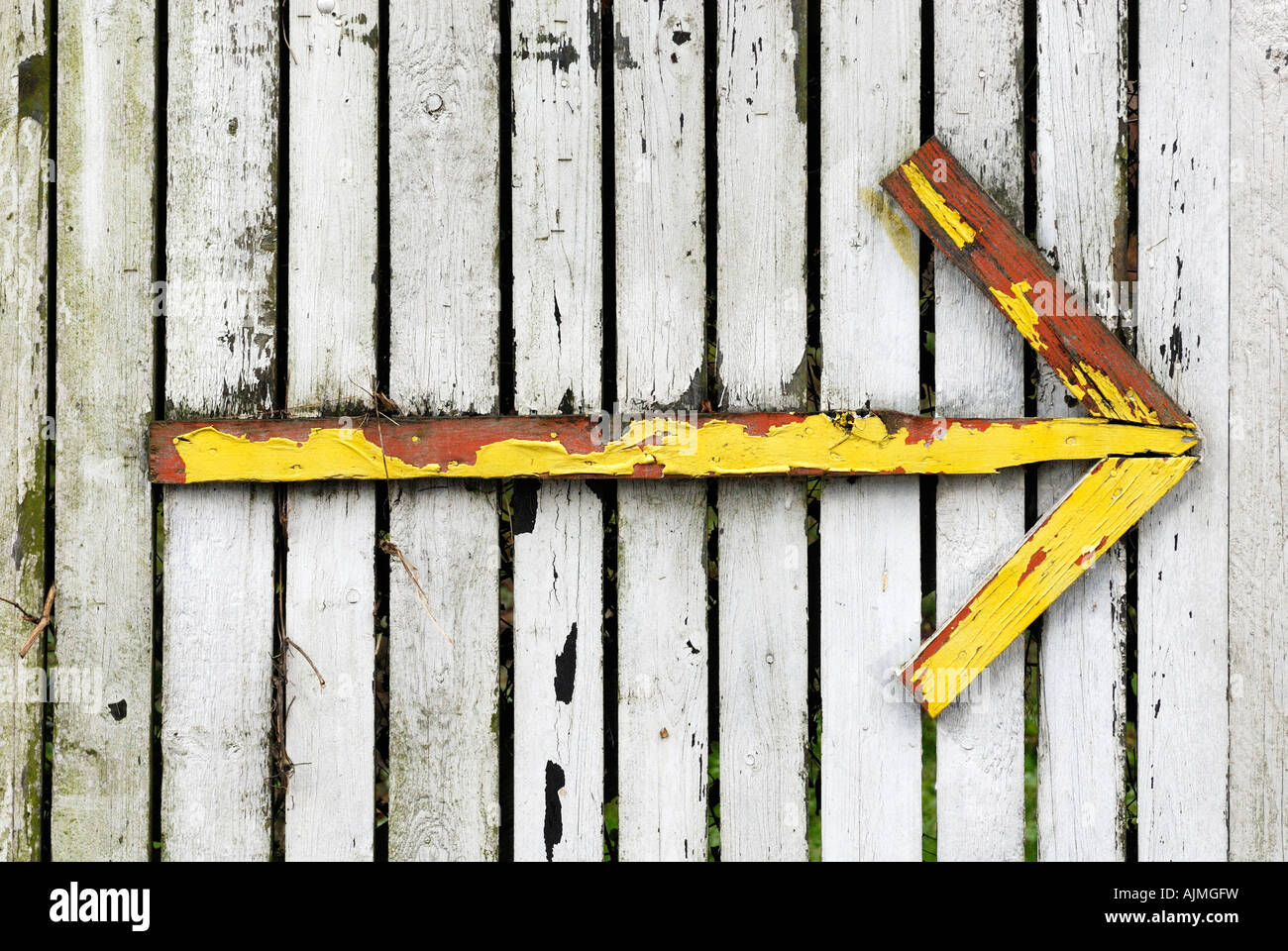 An arrow drawn on a wood wall Stock Photo - Alamy