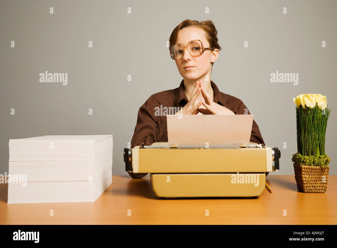 Office worker sitting at desk Stock Photo - Alamy
