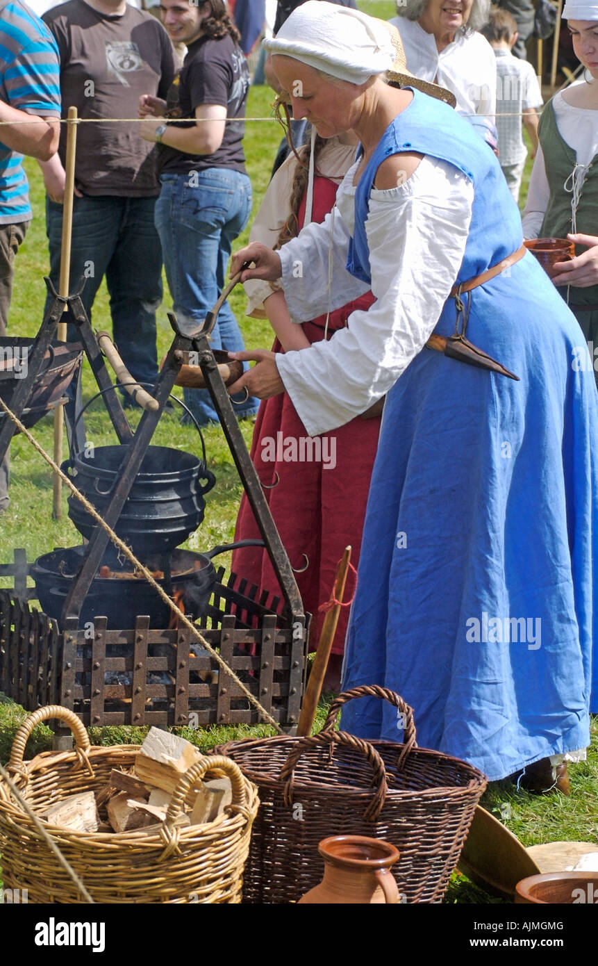 Entertainer dressed as a Medieval Serving wench taking part in a feast ...