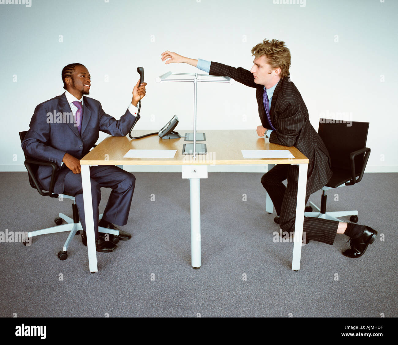 Two businesspeople passing hi-res stock photography and images - Alamy